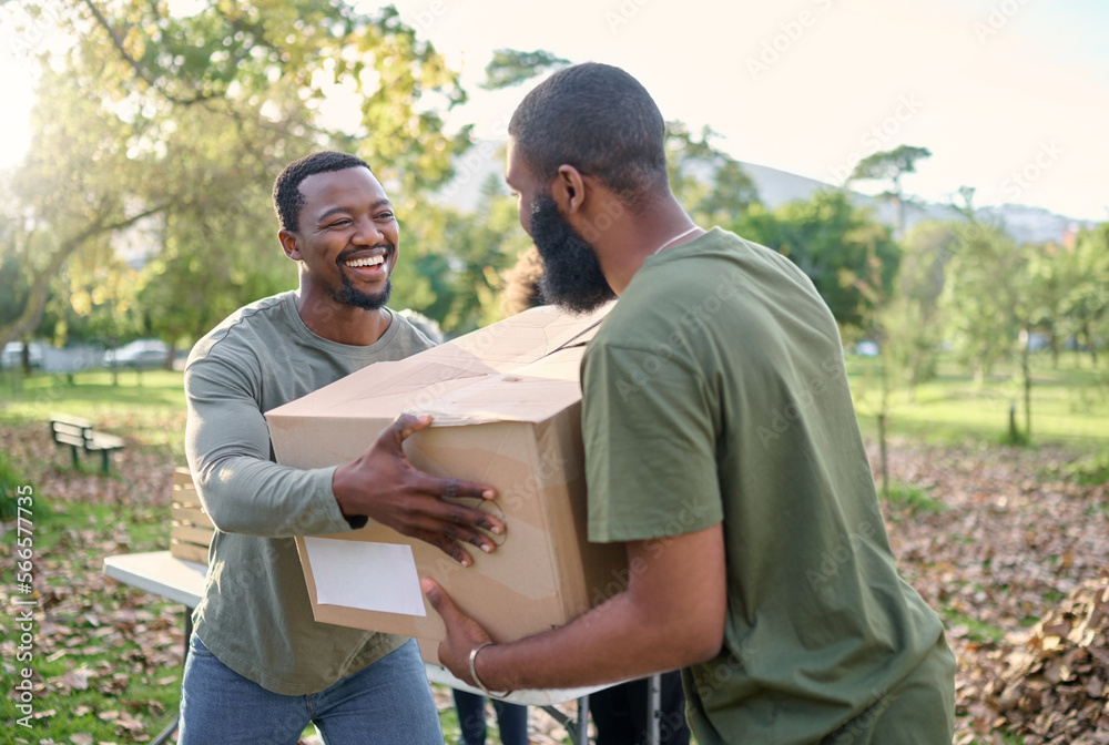 Foto de Black man, charity and holding box in park of donation, community service or social ...