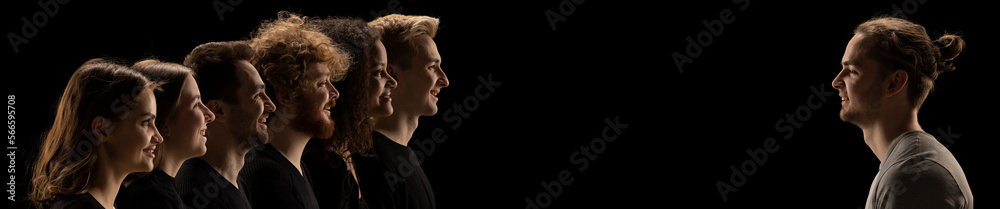 Side view portraits of different people smiling to young man over dark ...