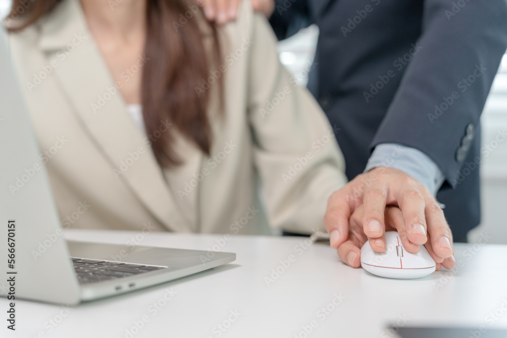 businessman sexually harassed a female colleague by touch her shoulder ...