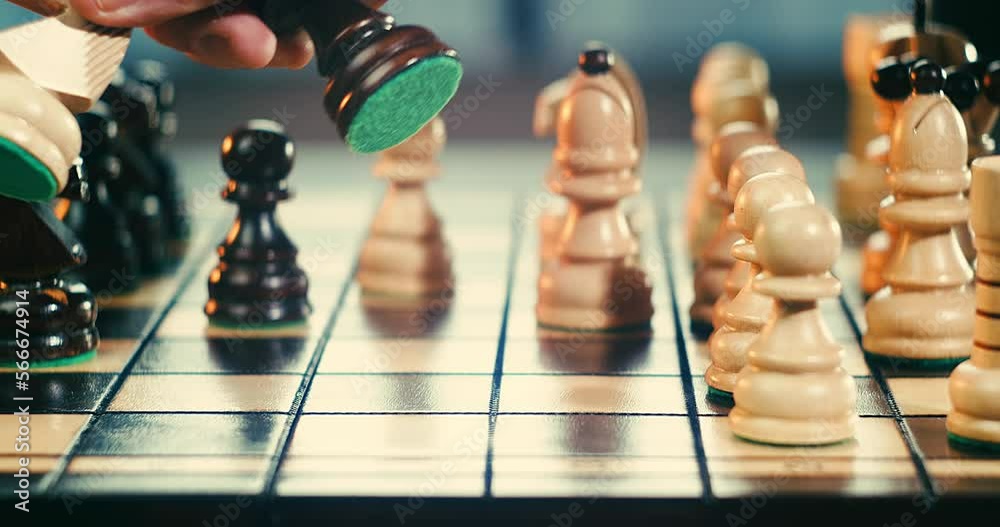 Stockvideo Chess game. Close-up view hand makes strategic move with ...