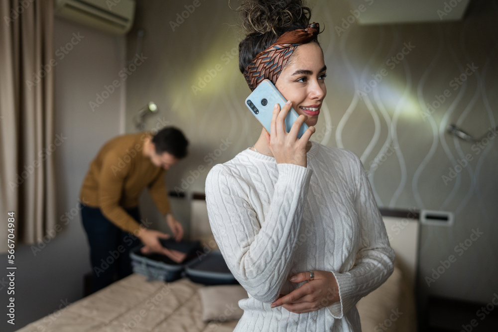 couple young beautiful woman and man in hotel room wife or girlfriend ...