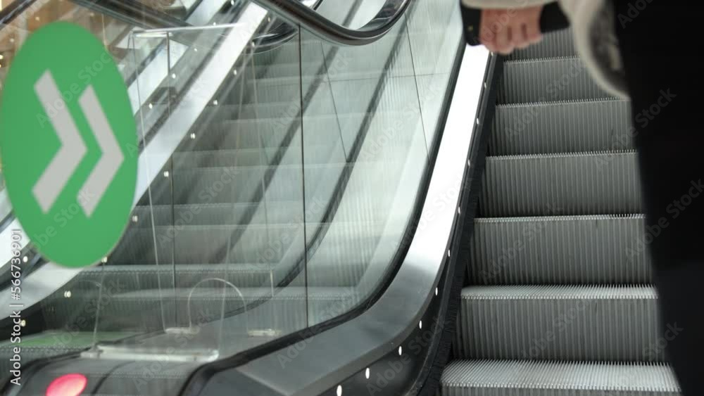 metal excavator, Shopping Center, Safety awareness. Escalator with ...