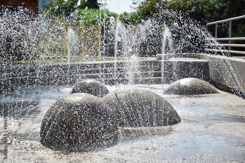 Water spraying and splashing from vertical jets and ground spray ...