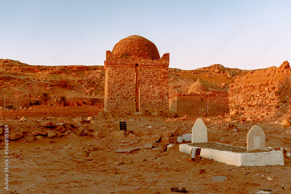 Cemetery of Kenadsa ksar in Bechar. Algeria. Two mausoleum domes, old ...