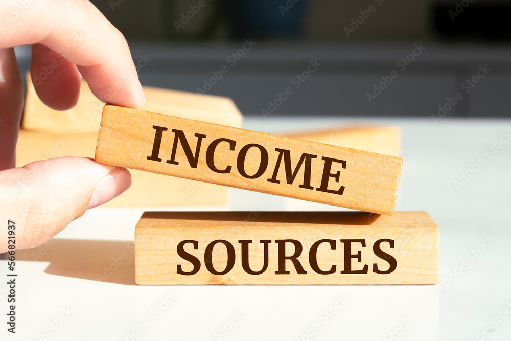 Wooden blocks with words 'INCOME SOURCES'. Business concept Stock Photo ...
