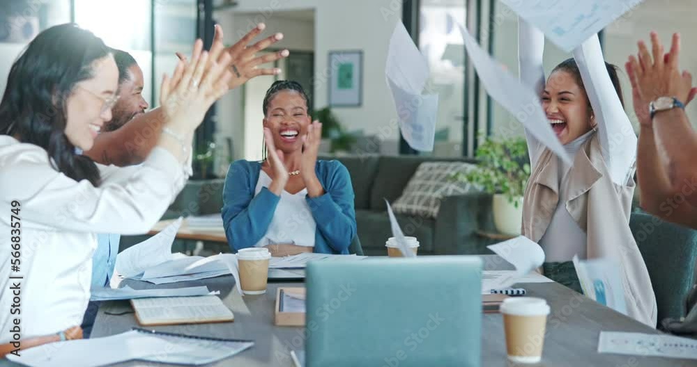 Business people throw paper in air for winning, success and celebration meeting clapping ...