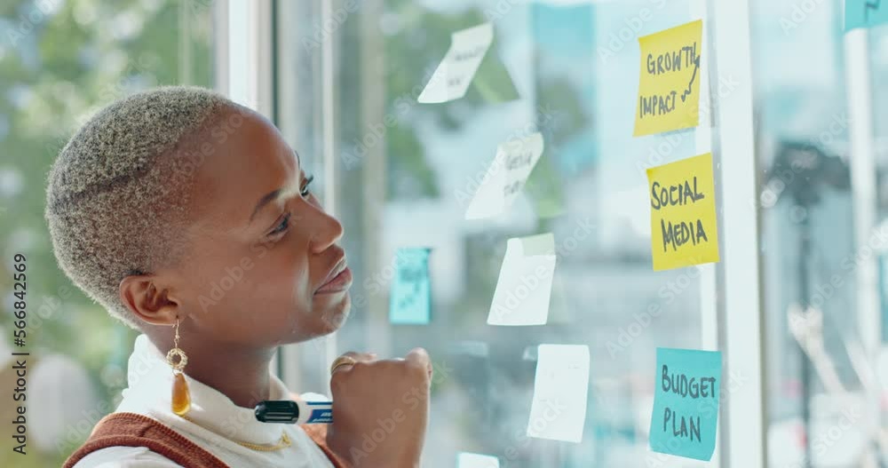 Thinking, brainstorming and black woman with smile at moodboard writing ...