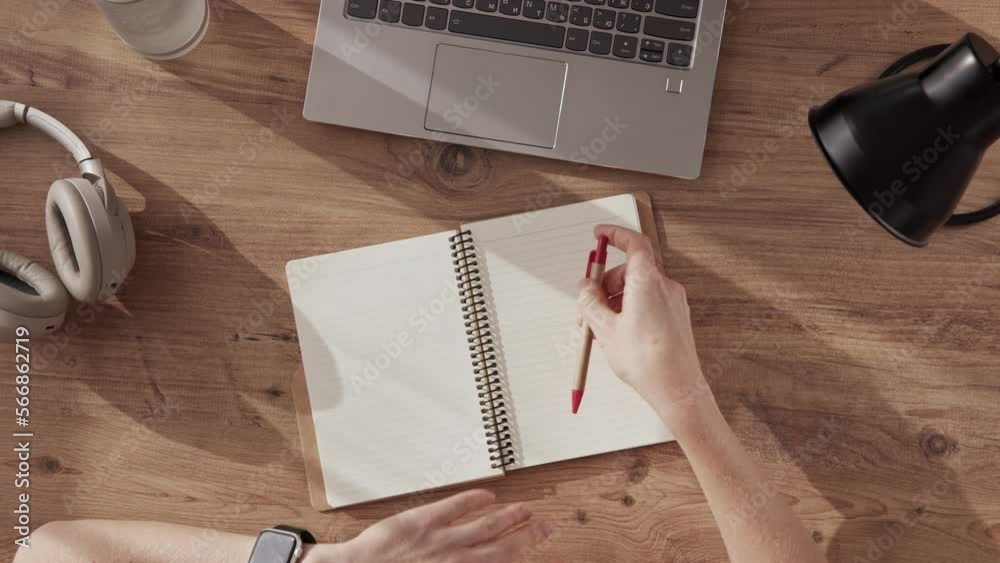 Video Stock Top down view of girl open her notebook made of eco ...