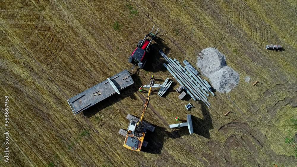 Telescopic handler unloading materials for building on the the site ...