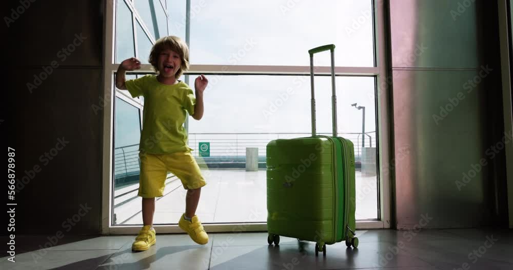 The boy dances eccentric and funny dance, expressing his joy ...