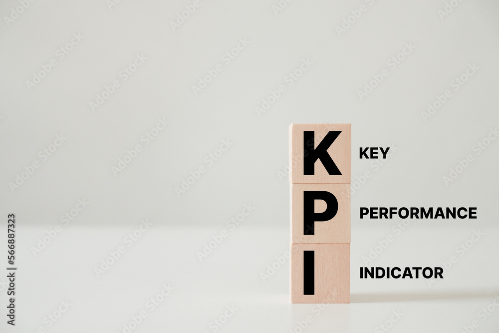 Business concept. Acronym text KPI - key performance indicator. Wooden ...