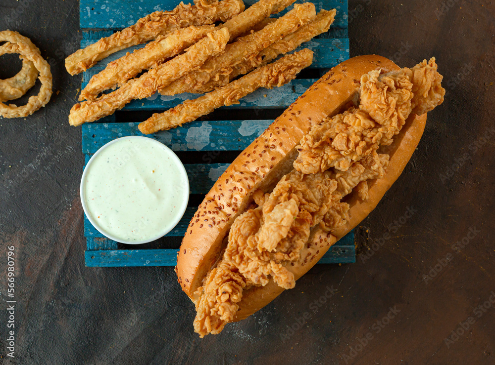 KFC crispy chicken sandwich with fries and sauce from top view Stock ...
