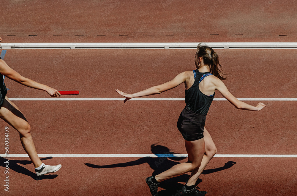 relay race female athletes runners track and field athletics ...