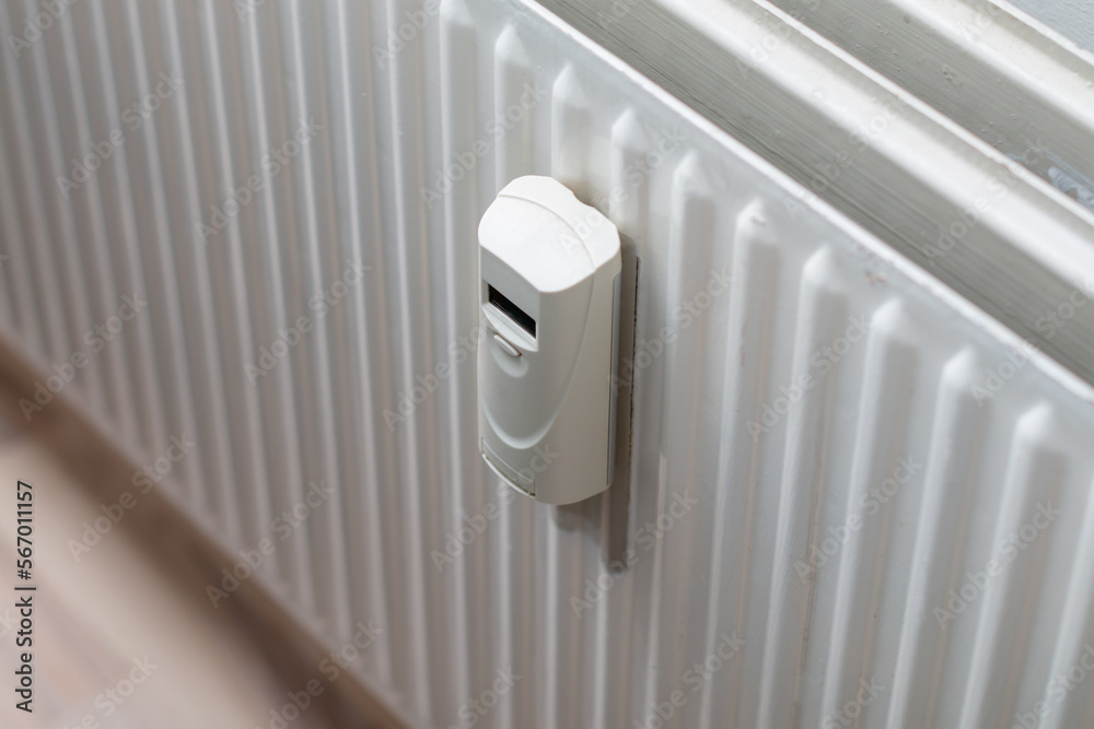 Heat meter the radiator - temperature sensor - heat price Stock Photo ...
