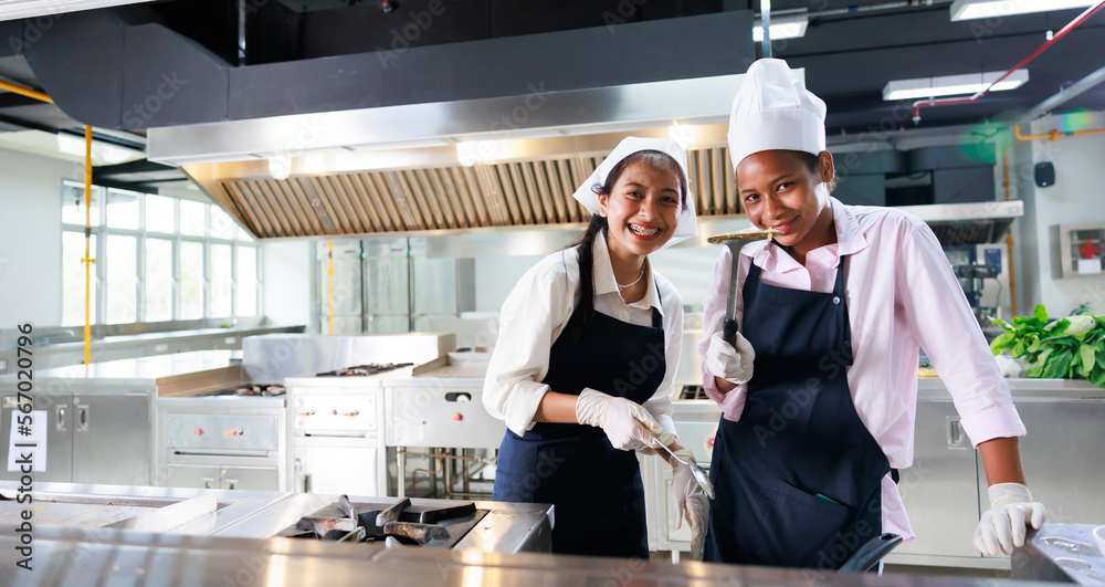 Group portrait young wman cooking student. Cooking class. culinary ...