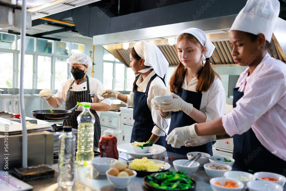 Senior asian woman chef teach student. Cooking class. culinary ...