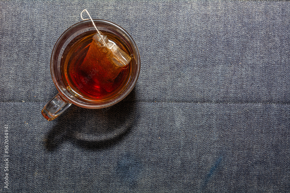 hot tea drink from ready-to-drink tea sachets lying on the floor. Stock ...