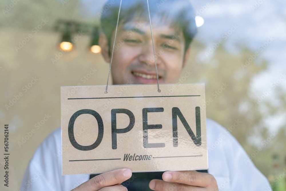 owner changed the sign from closed to open on the first day of business ...