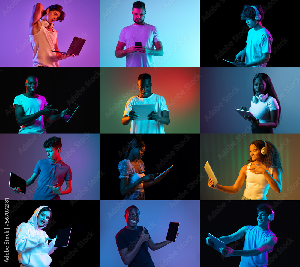 Young motivated emotional women and man demostrate tablet screen, using ...