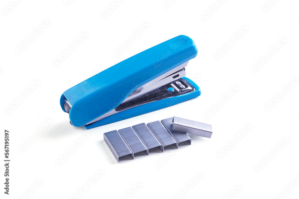 Blue stapler and staples isolated on white background, Equipment used ...