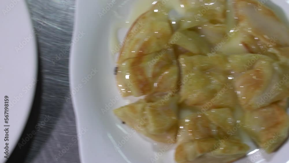 2 Roti topped with Chocolate sauce and sweetened condensed milk are ...