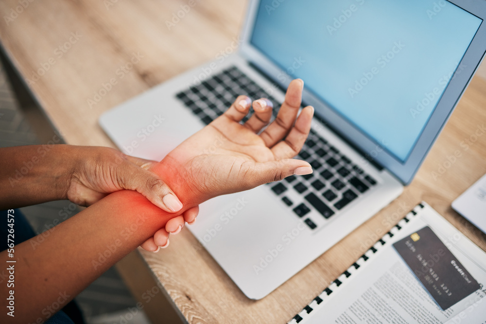 Pain, working and wrist of black woman with laptop and injury, joint ...
