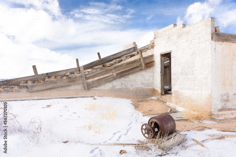 Exterior of storage barn, deserted adobe potato bunker, San Luis Valley ...