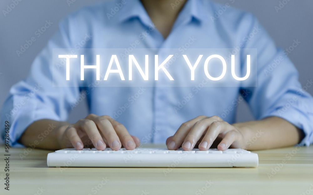 thank you message displayed on a virtual screen. Stock Photo | Adobe Stock