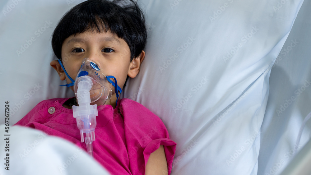 Sick boy inhalation therapy by the mask of inhaler. Baby has asthma and ... Sick boy inhalation therapy by the mask of inhaler. Baby has asthma and ...