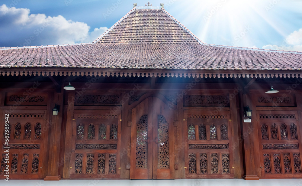 Javanese traditional house. The doors (called Gebyok), windows and ...