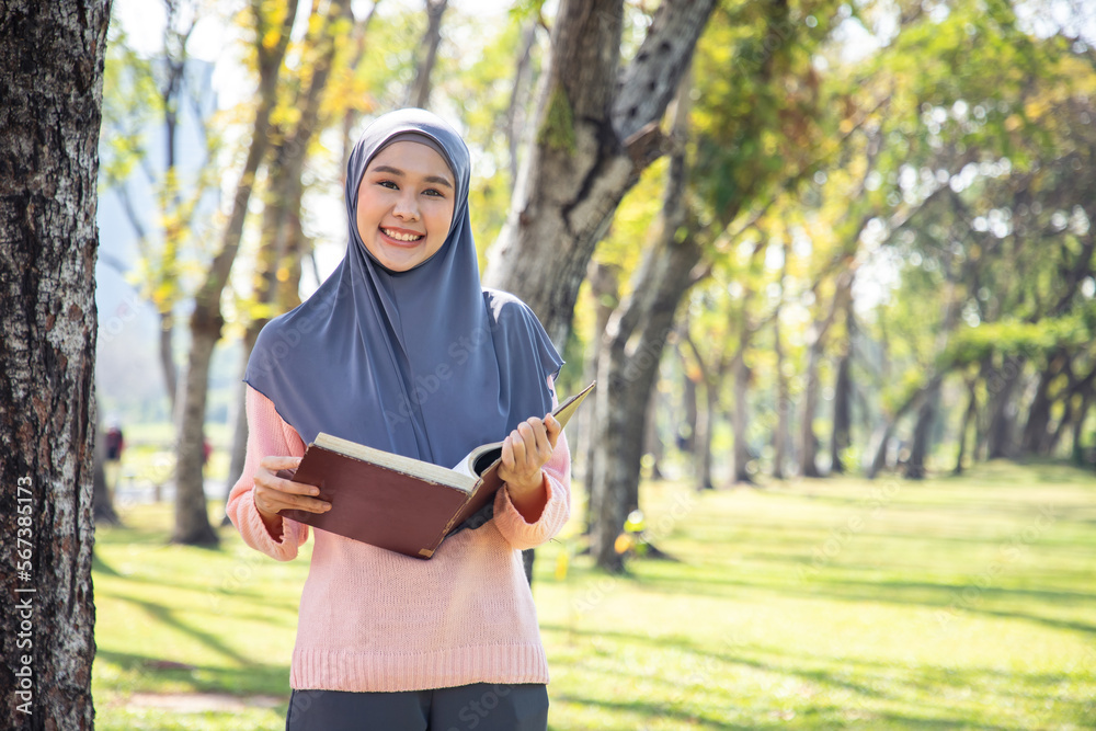 Education for Muslim Asian woman. Smiling Beautiful student lady in ...