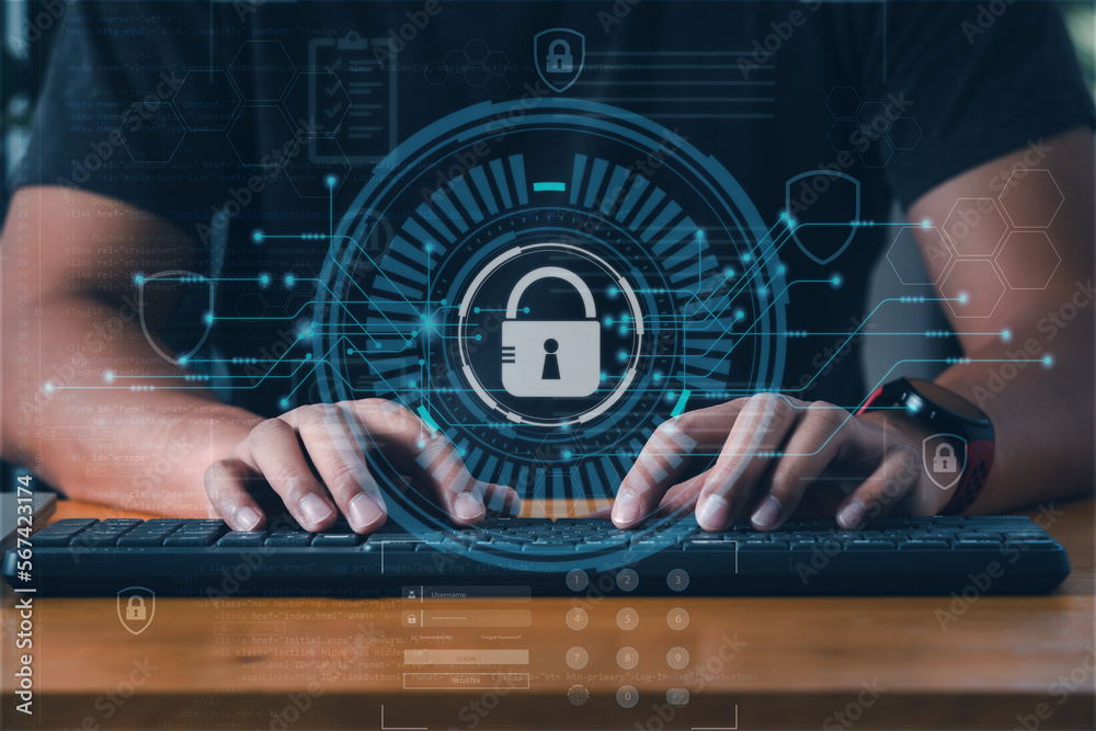 A programmer typing a code on a keyboard to protect a cyber security from hacker attacks. online ...