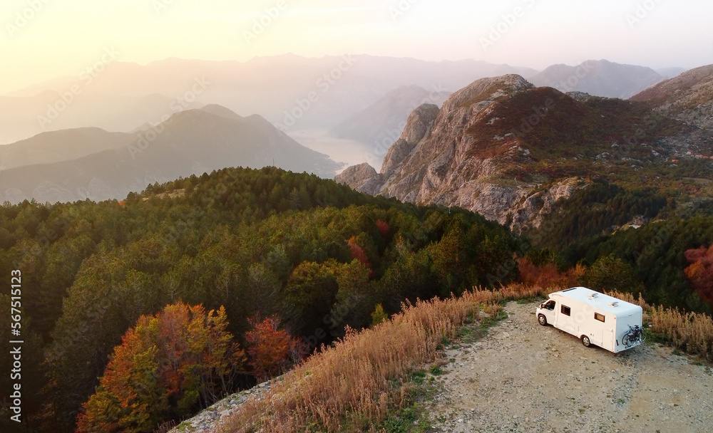 Drone aerial view of parked big modern camper motorhome. Family ...