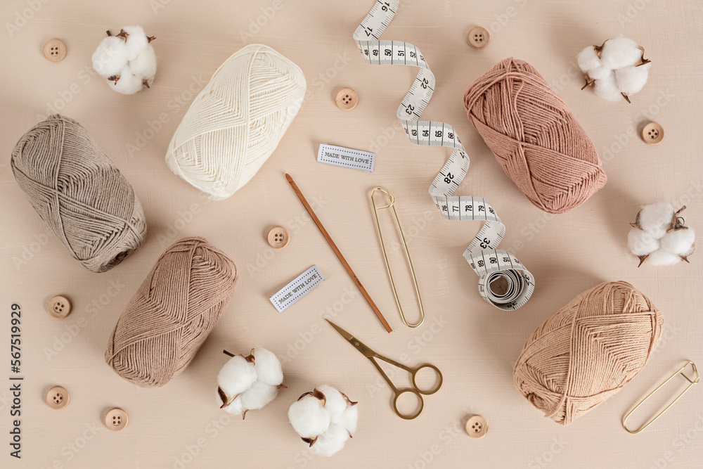 Craft knitting hobby background with yarn in natural colors ...