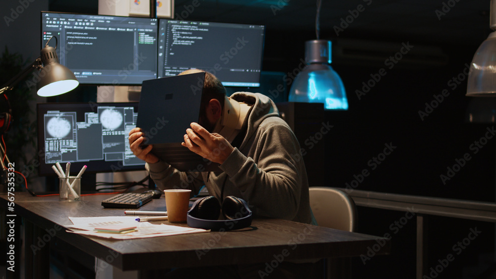 Database Admin With Neck Collar Foam Working On Code Developing At Night Typing Html Script On