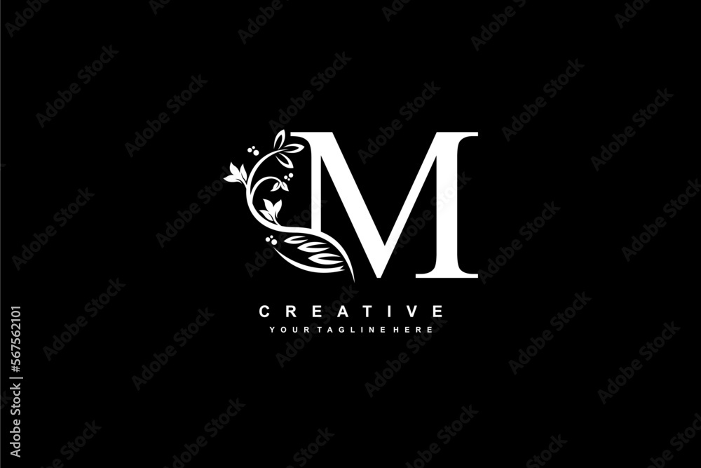 letter M logo design with flowers, leaves and feathers in a beautiful ...