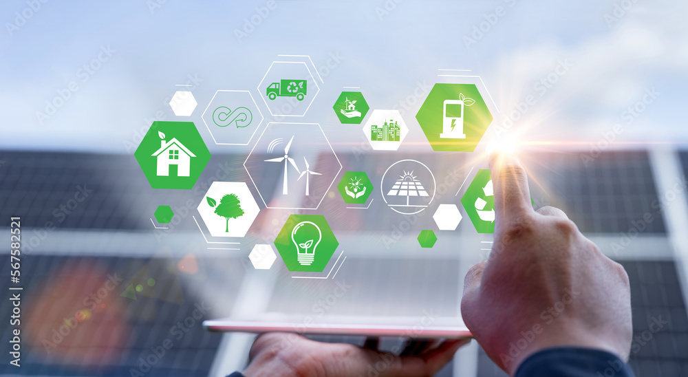 Hand with an icon of energy in front show symbols of various energies ...