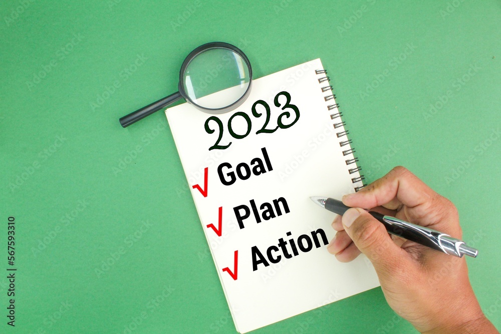 notebook with the words Goal, Plan, Action for the year 2023. checklist ...