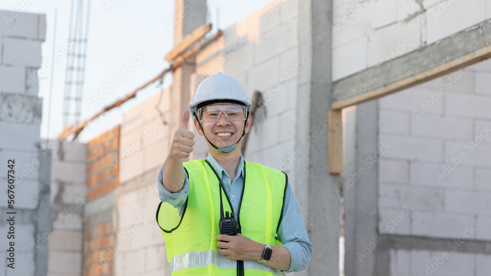 Professional engineer inspecting the construction of a house or factory ...