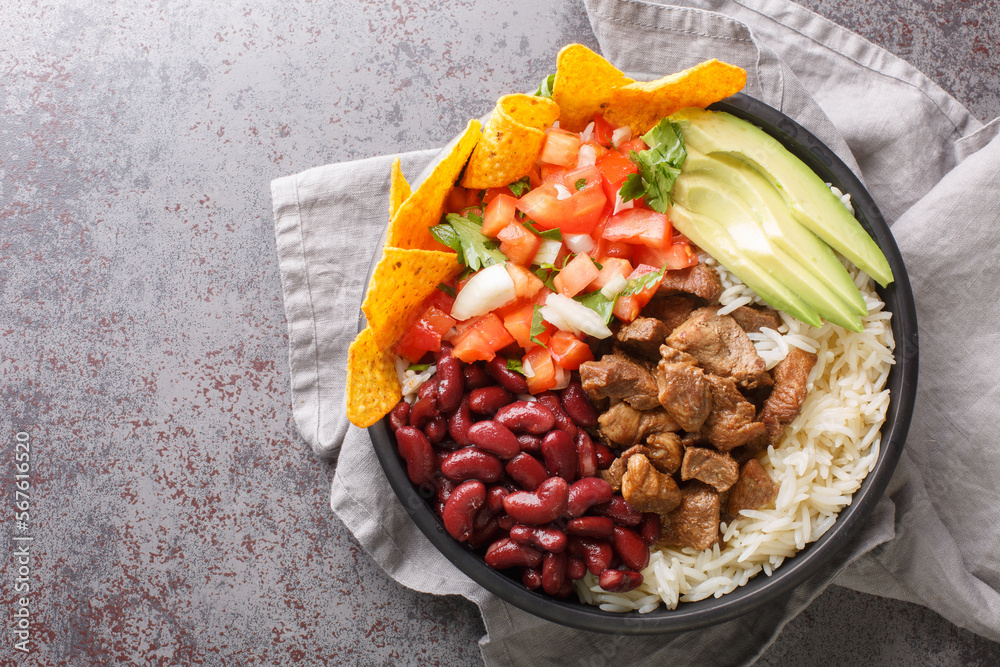 Costa Rican chifrijo is a layered dish of tender beans topped with ...