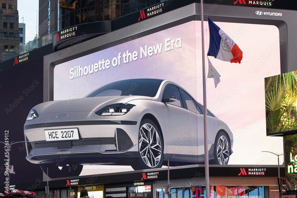 New York, NY, USA - July 2, 2022: Video ads of the new Hyundai IONIQ 6 electric sedan is seen on ...