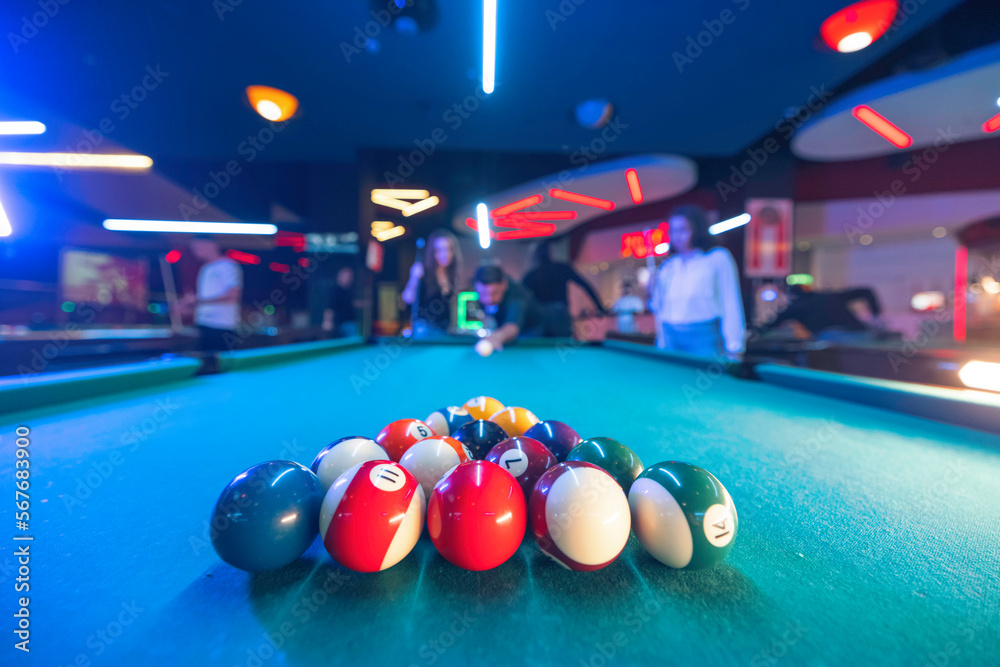 The excitement and challenge of a game of billiards are on full display ...