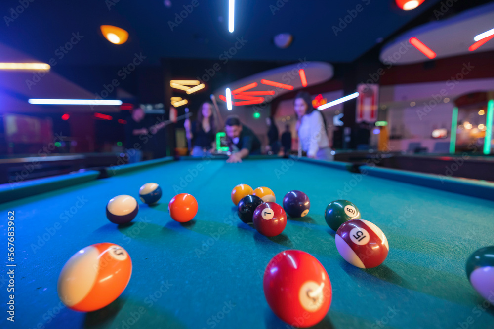 Effortless shots and smooth play on display in a game of billiards, a ...