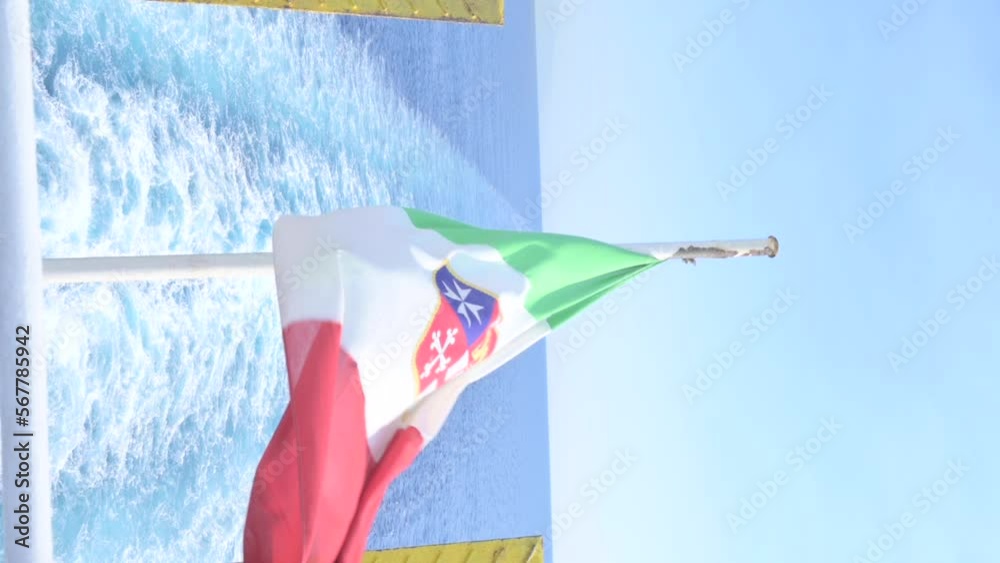 The italy flag flutters in the wind. The symbol of italy on board a ...