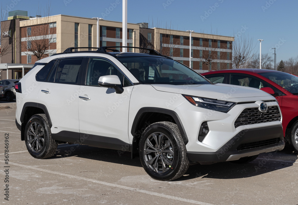 Toyota RAV4 Hybrid display at a dealership. Toyota offers the RAV4 in ...