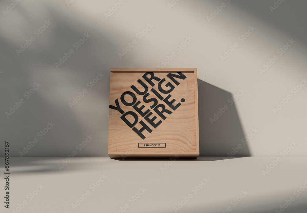 Wooden box Mockup standing on white table Stock Template | Adobe Stock