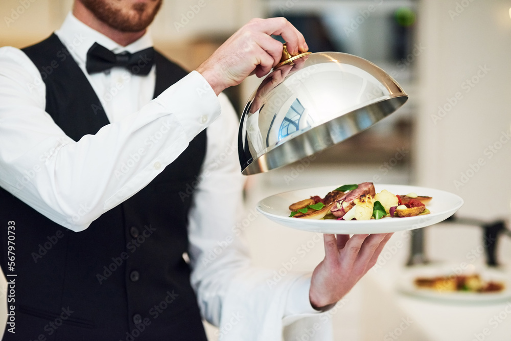 Waiter, hands and opening plate of food for serving, meal or customer ... Waiter, hands and opening plate of food for serving, meal or customer ...