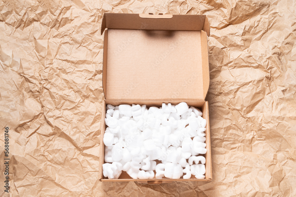 White Packaging Chips, Styrofoam peanut in cardboard box Stock Photo ...