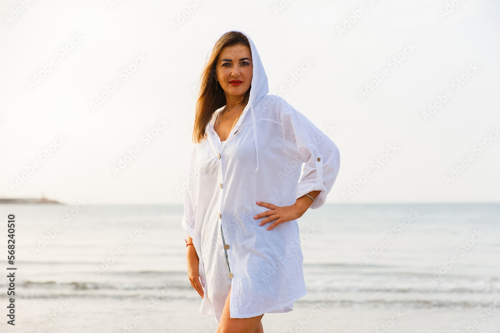 Portrait of a woman on the beach, ocean, unity with nature, healthy ...