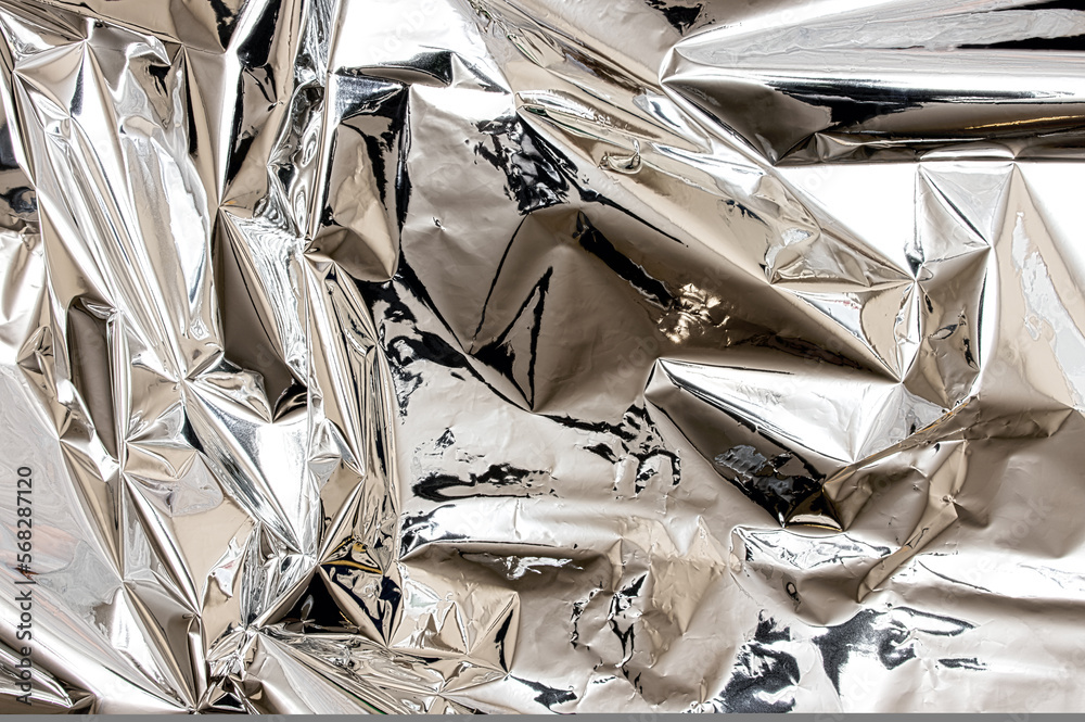 Shiny silver foil close-up. Abstract background Stock Photo | Adobe Stock